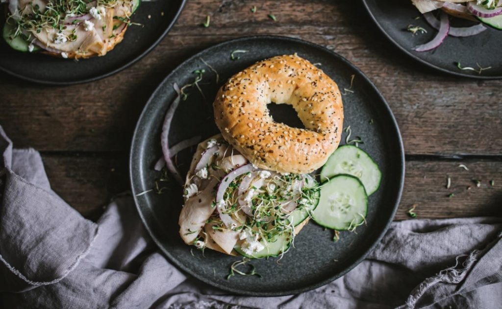 Deli Turkey Meat on an Everything Bagel with Red Onion, Cucumber ...